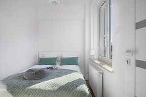 Quarto casal ou duplo premium | Área de estar | TV