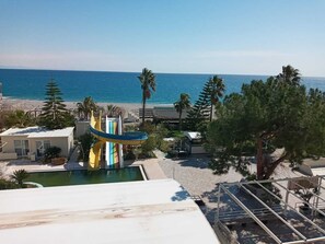 Quarto casal standard, vista para a piscina | Terraço/pátio
