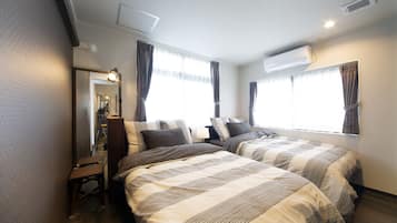 Casa básica | 2 quartos, Wi-Fi de cortesia, roupa de cama