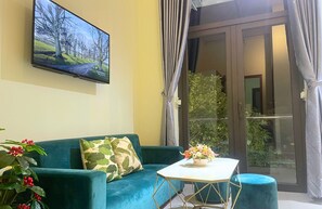 Suíte, 2 quartos | TV