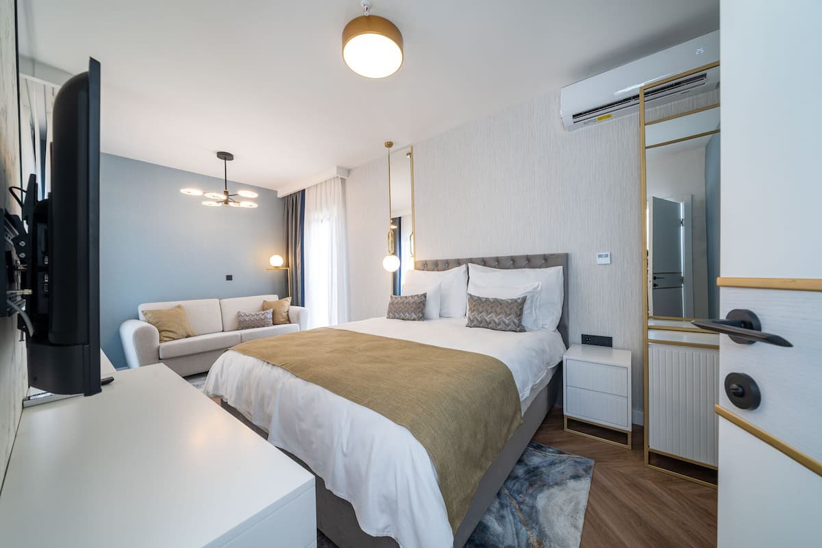 Suite-Estúdio Júnior | 1 quarto, camas de colchão viscoelástico, minibar