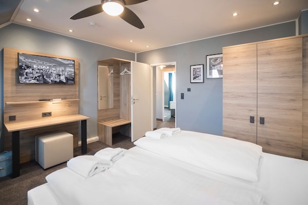 Apartamento urbano, para não fumantes, vista para o rio | 3 quartos, cofres nos quartos, escrivaninha, cortinas blackout