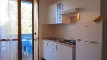 Estúdio, vários quartos, varanda | Interior