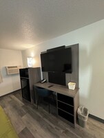 Quarto básico | Área de estar | TV 32 polegadas com canais a cabo