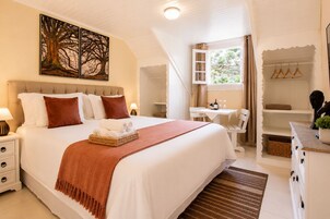 Suite Familiar | Minibar, Wi-fi grátis, roupa de cama fornecida