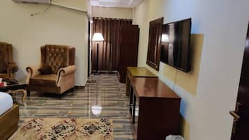 Quarto executivo | Wi-Fi de cortesia, roupa de cama