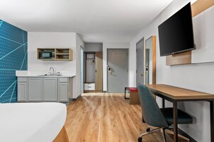 Suíte, 1 cama King e sofá-cama, para não fumantes (Upgrade) | Roupas de cama premium