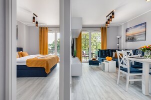 Apartamento Comfort | Sala de estar | Televisor plasma de 50 polegadas com canais digitais, televisor 