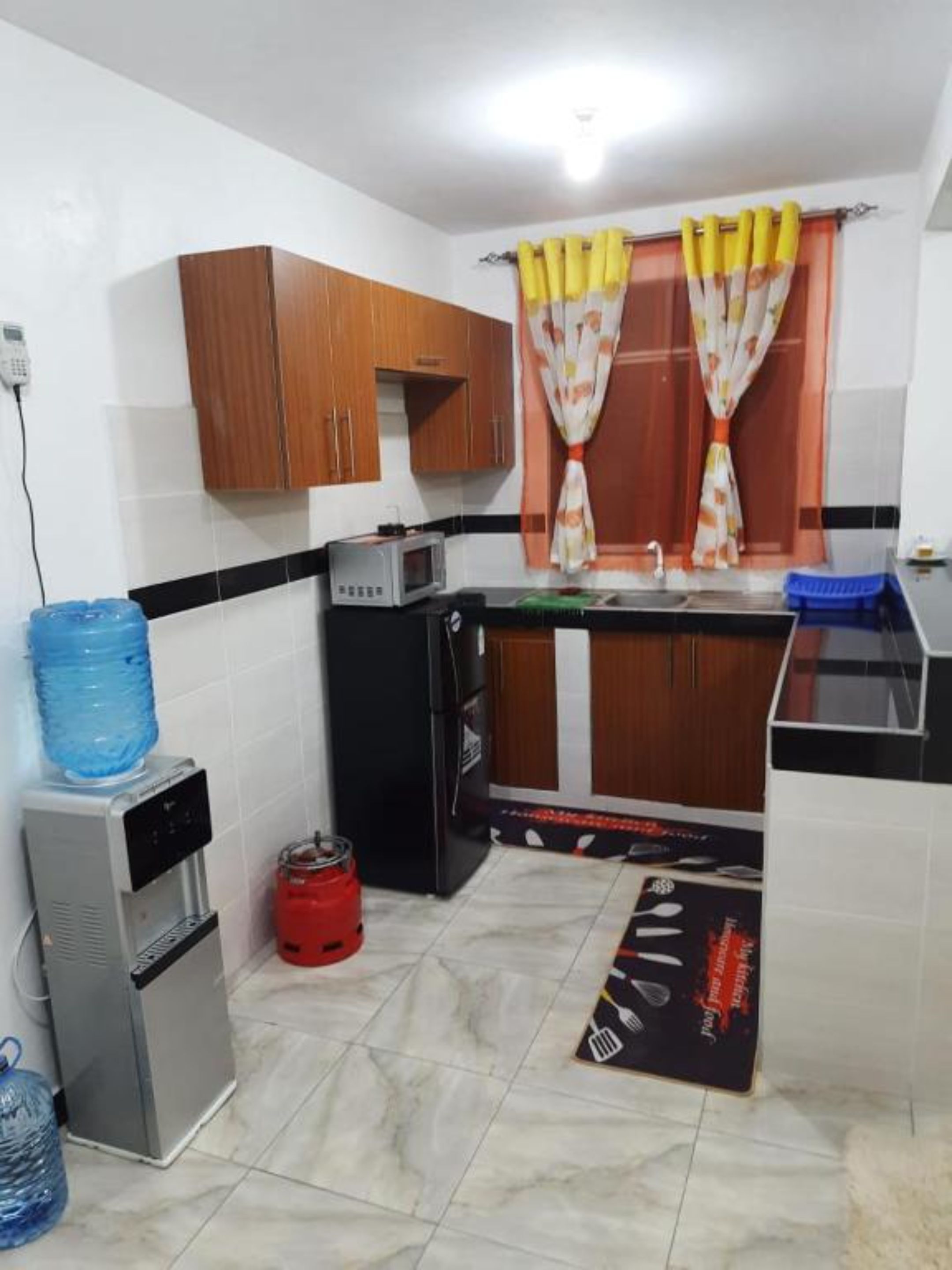 Apartamento, 1 quarto | Cozinha privada | Minifrigorífico, um micro-ondas, uma placa de cozinha, liquidificador 