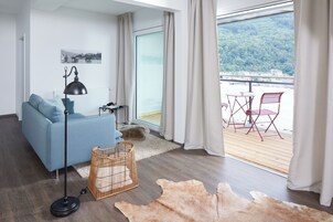 Quarto casal exclusivo | Área de estar | TV de tela plana