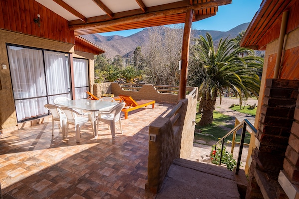 Cabana de Madeira Familiar, vista para a lagoa | Terraço/pátio interior