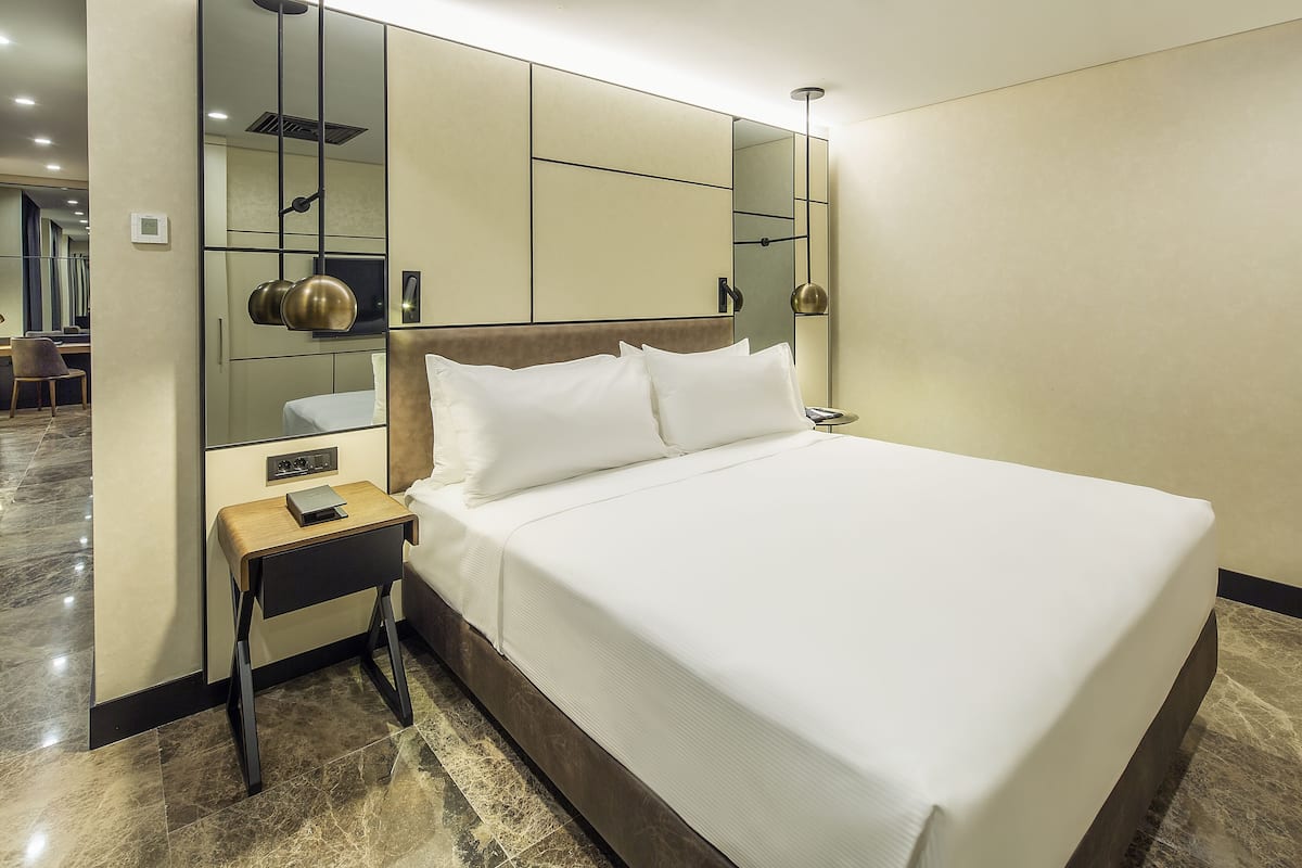 Junior Suite King Mountain View | Roupa de alta qualidade, minibar, cofre no quarto