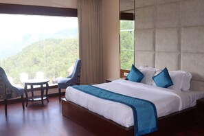 Minibar, cofre no quarto, ferro/tábua de engomar, camas desdobráveis