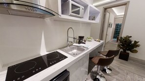 Apartamento Deluxe, 1 cama queen-size e sofá-cama, não fumadores | Cozinha privada | Minifrigorífico, um micro-ondas, uma cafeteira/bule, uma torradeira
