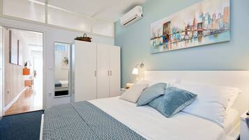 Apartamento (1 Bedroom) | 1 quarto, cofres nos quartos, ferros/tábuas de passar roupa