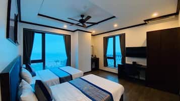 Minibar, secretária, cortinas/cortinados opacos, quartos insonorizados