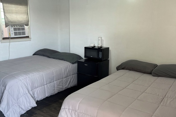 Quarto casal conforto, 2 camas de casal | Roupas de cama premium, camas Tempur-Pedic, Wi-Fi de cortesia
