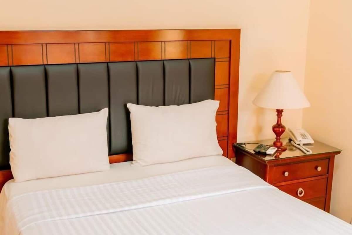 Quarto Básico | Roupa de cama fornecida