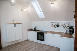Apartamento Deluxe | Sala de estar