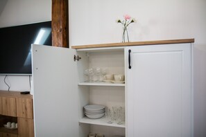 Apartamento Deluxe | Cozinha privada | Um frigorífico
