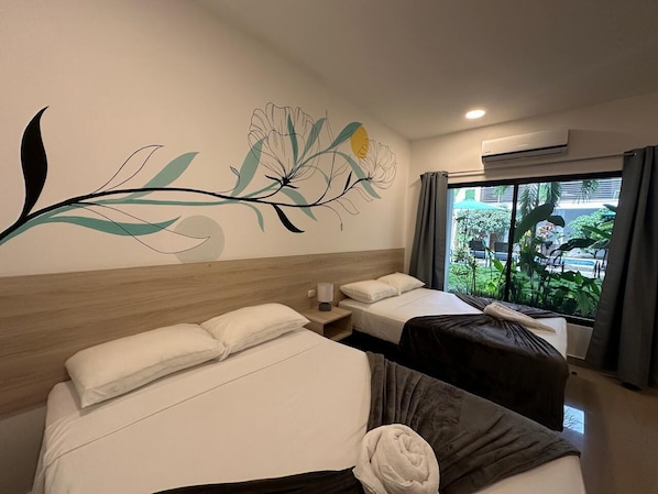 Quarto standard | 2 quartos, Wi-Fi de cortesia, roupa de cama