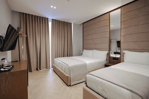 Minibar, Wi-fi grátis, roupa de cama fornecida