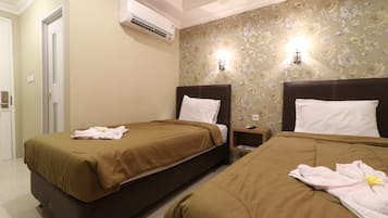 Quarto duplo luxo | Escrivaninha, Wi-Fi de cortesia, roupa de cama