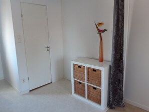 Quarto conforto | Banheiro | Chuveiro, chuveiro com efeito de chuva, toalhas de banho 