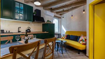 Apartment Wow Wau | Sala de estar | Televisor de ecrã plano de 50 cm com canais via satélite, televisor