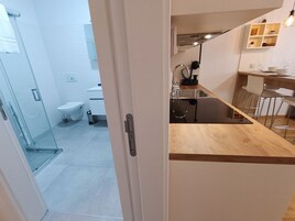 Apartamento Superior | Casa de banho | Piso aquecido (casa de banho), sabão, champô 