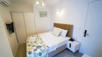 Quarto Standard | Roupa de alta qualidade, minibar grátis, com decoração personalizada
