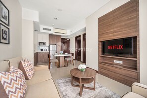 Apartamento, 1 quarto, Vista para a cidade | Sala de estar | Smart TV, Netflix, serviços de streaming