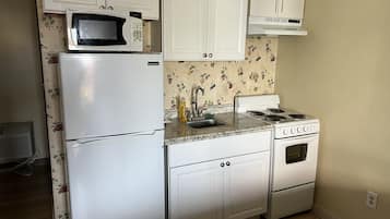 Quarto conforto, 1 cama King, cozinha | 2 quartos, roupa de cama