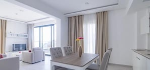 Quarto casal luxo | Área de estar