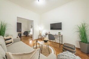 Quarto Duplo Cidade | Sala de estar | Escritórios 