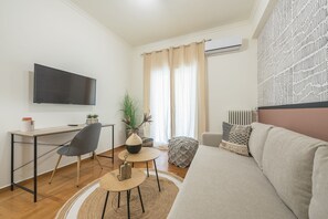 Quarto Duplo Cidade | Sala de estar | Escritórios 