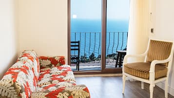 Suite-Estúdio Panorâmica | Sala de estar