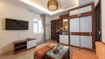 Suite Familiar | Minibar, cofre no quarto, quartos insonorizados, Wi-fi grátis