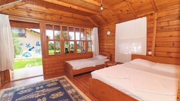 Bungalow Deluxe, 1 quarto, não fumadores, vista para o mar | 1 quarto, roupa de alta qualidade, minibar, com decoração personalizada
