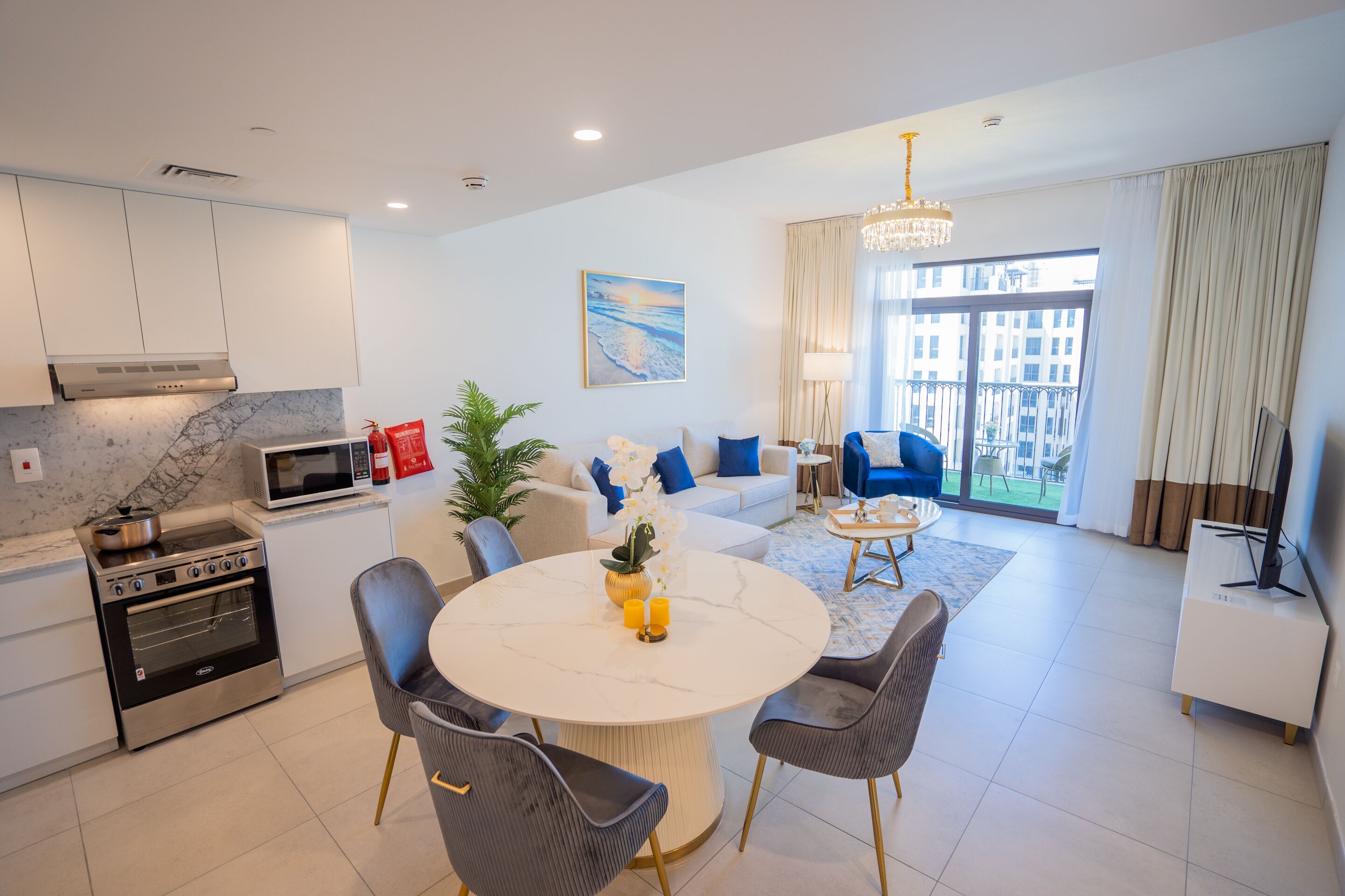 Apartamento conforto | Área de estar | TV de tela plana 55 polegadas com canais a cabo, TV