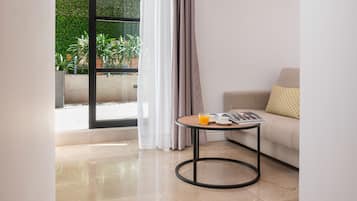 Quarto Premium | Sala de estar | Televisor LED