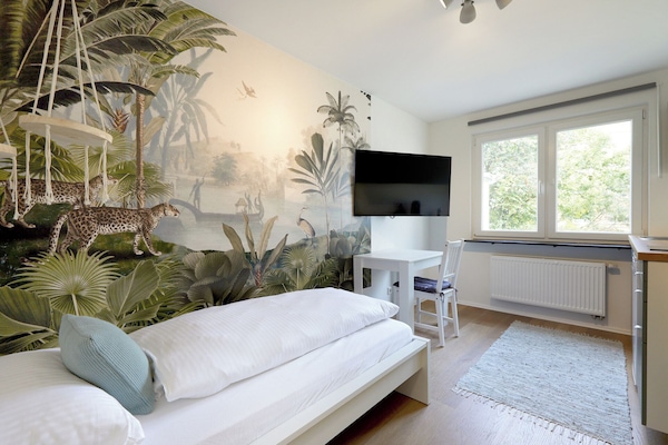 Apartamento urbano | 1 quarto, frigobar, cofres nos quartos, individualmente decorados