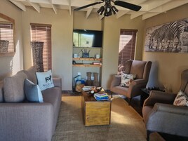 Casa Familiar | Sala de estar | Televisor de 40 polegadas com canais digitais, Netflix 