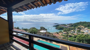 Quarto triplo luxo, vista para o oceano | Terraço/pátio