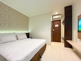 Quarto casal superior | Escrivaninha, Wi-Fi de cortesia, roupa de cama