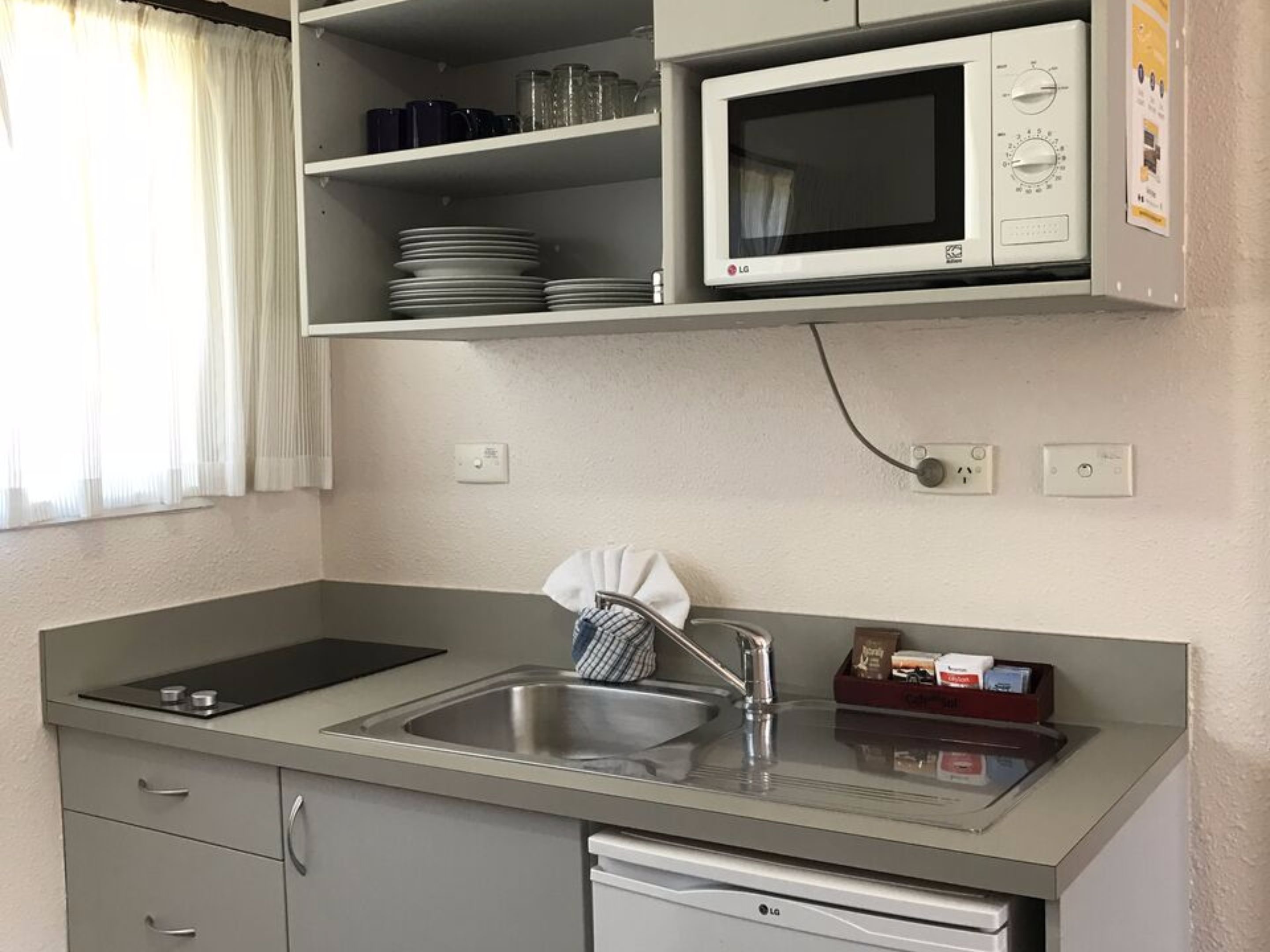 Quarto, 1 quarto | Cozinha americana privada | Micro-ondas, chaleira elétrica, torradeira