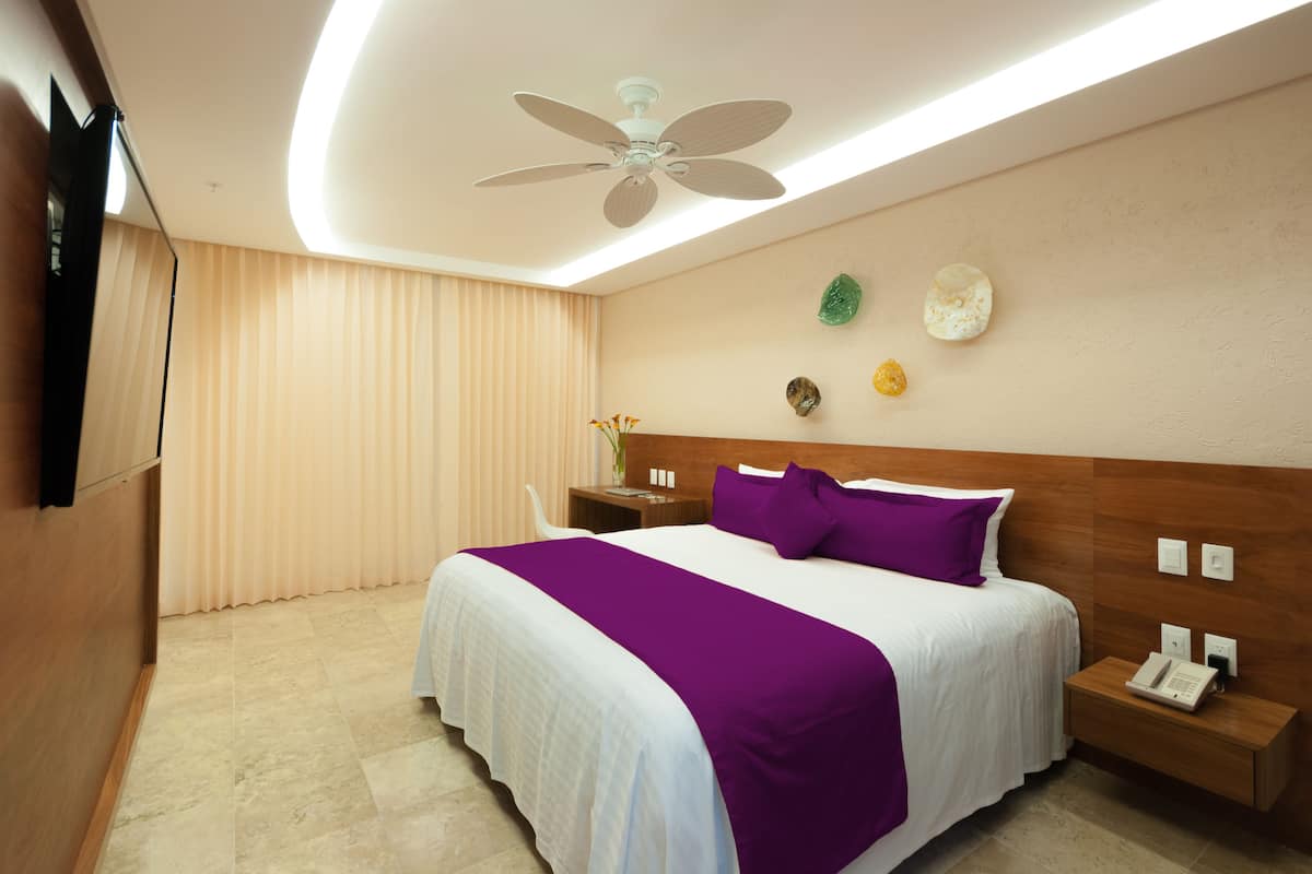Quarto Deluxe | 1 quarto, roupa de alta qualidade, minibar, cofre no quarto