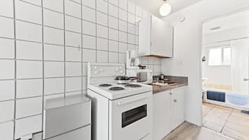 Suite, 1 quarto, cozinha (2 beds) | Cozinha privada | Um frigorífico, uma cafeteira/bule