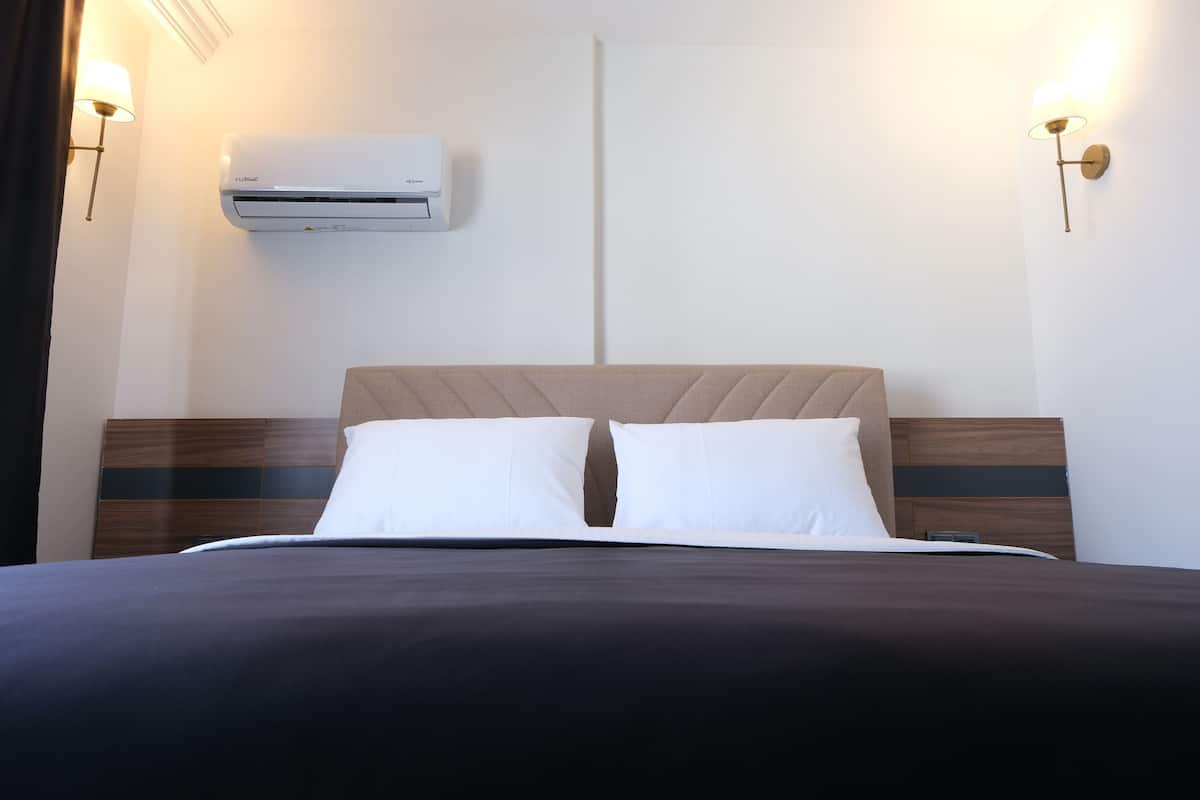 Quarto standard | Roupas de cama premium, frigobar, Wi-Fi de cortesia, roupa de cama