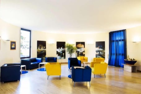 Área de estar no saguão. Parco De Medici Residence Hotel